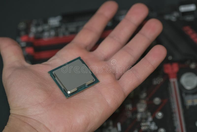 Man Hand Hold Desktop Pc Cpu Processor Over Hi Tech Motherboard ...