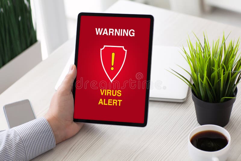 Man Hand Holding Computer Tablet with Warning Virus Alert Alarm Stock ...