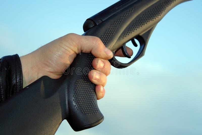 Man Hand Holding Gun Over Sky Stock Image - Image of violence ...