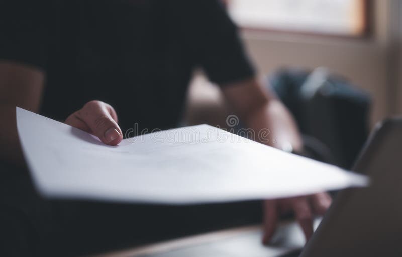 Man Hand Holding or Handing Over Document Stock Photo - Image of ...