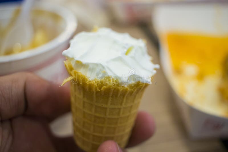 Man Hand Holding Ice Scream Cone Stock Image - Image of blue, scream ...