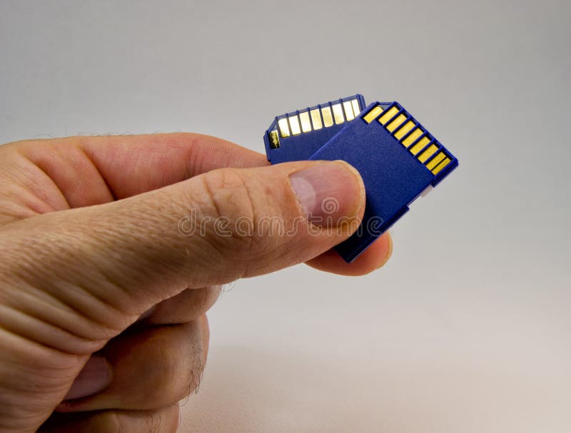 Man Hand Holding a Memory Card on a White Background. for Information ...