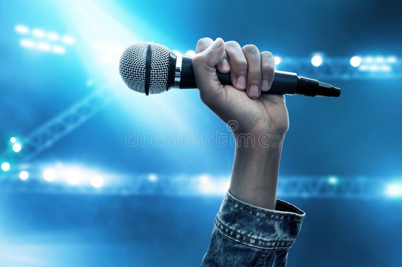 Man Hand Holding Microphone on the Stage Stock Photo - Image of male ...
