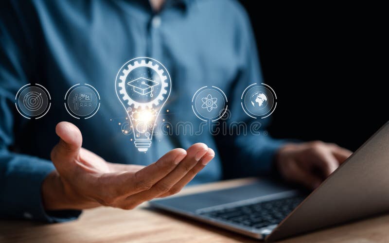 Man Hand Holding Virtual Light Bulb with Learning Education and ...