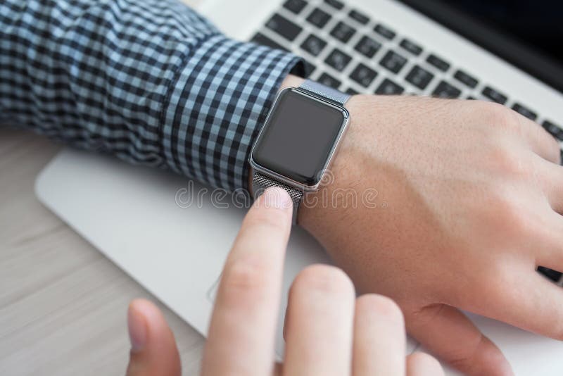 A Man Holding Laptop and Phone with an Isolated Screen Stock Image ...