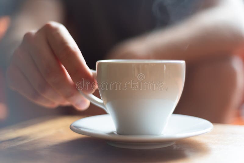 Man Hand Holding White Cap Tea Coffee Restaurant Stock Photos - Free ...