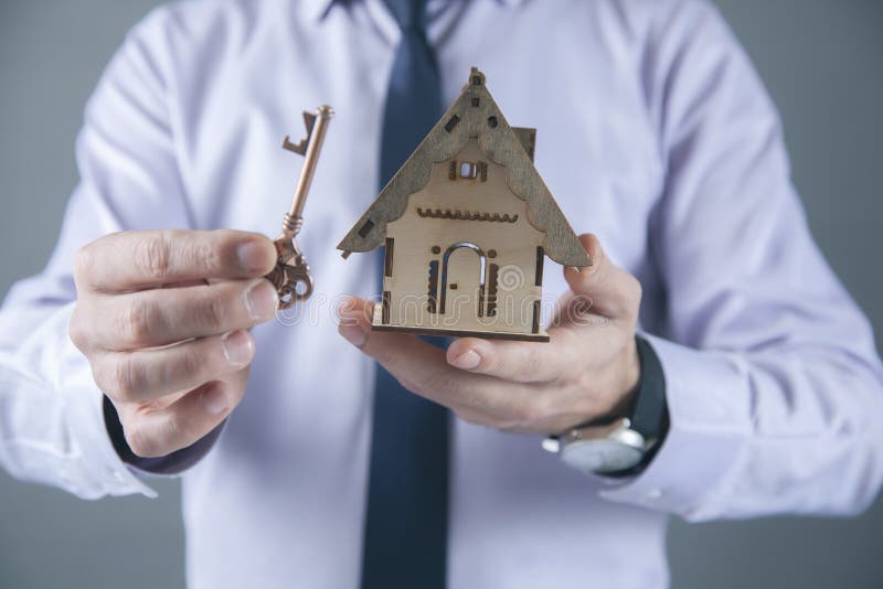 Man Hand House Model in the Screen Background Stock Image - Image of ...