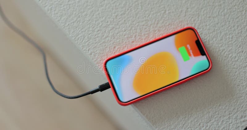 Man Hand Inserting a Charger into a Smartphone. Charging Connection To ...