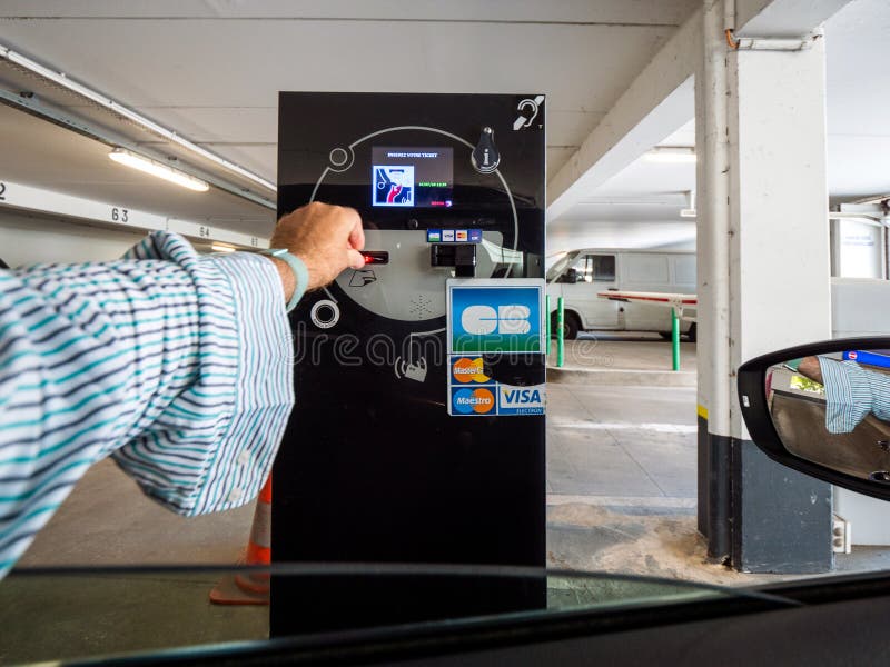 Inserting Ticket for Airport Parking Area Stock Image - Image of hand ...
