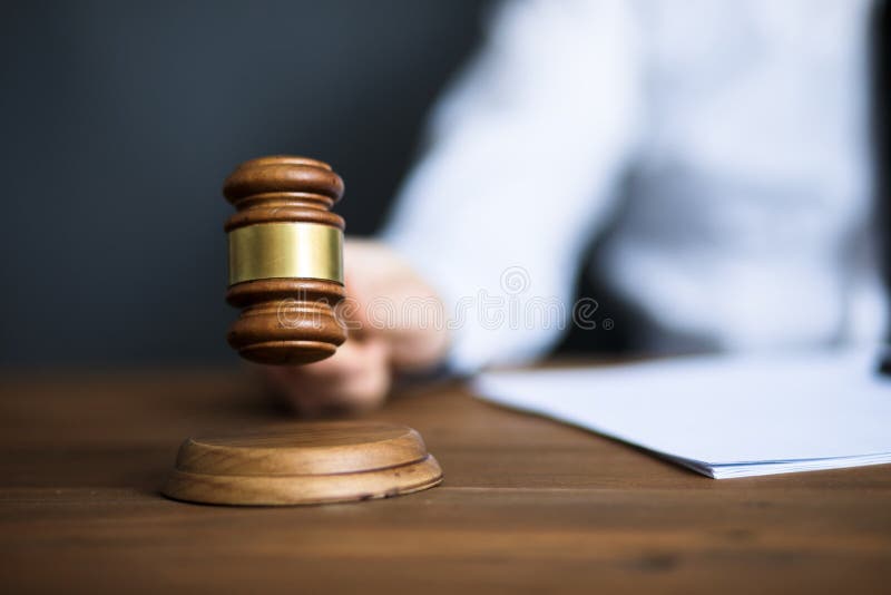 Hand of a Judge Holding a Hammer or Gavel Stock Image - Image of ...