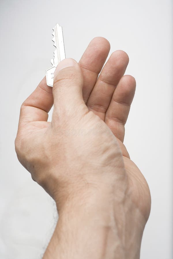 Man Hand and Key Over White Stock Photo - Image of life, activity: 6289536