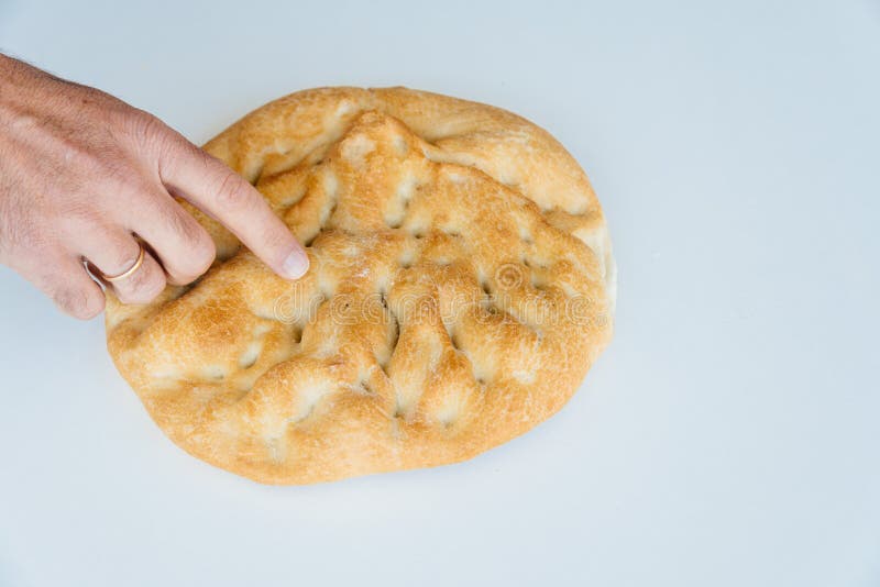 Man Hand on Loaf of Bread on White Table Stock Photo - Image of bread ...