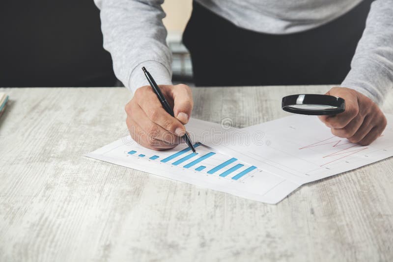 Man Hand Magnifier with Graph Stock Photo - Image of calculator ...