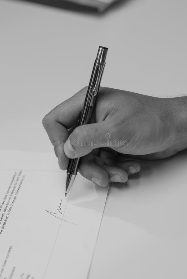 A Man Hand Making the Signature Stock Photo - Image of close, contact ...