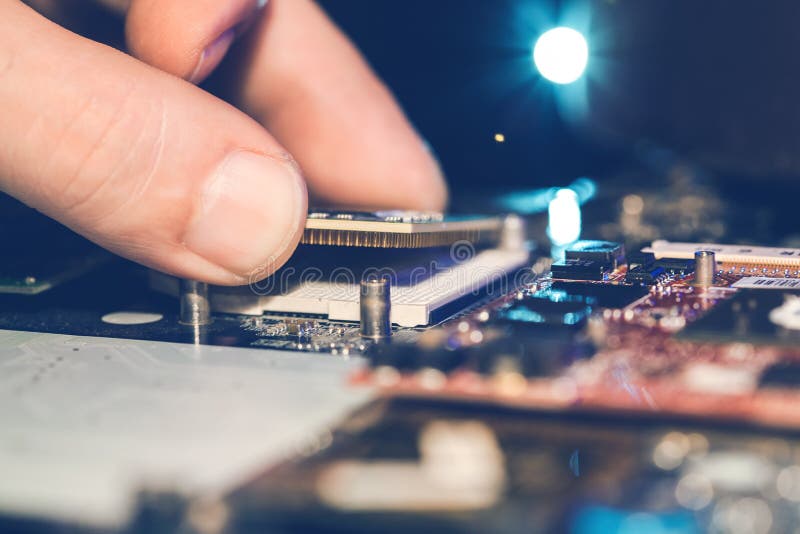 Man Hand Chip with Computer on Desk. Stock Image - Image of technology ...