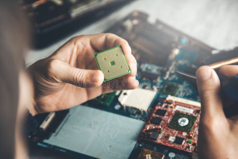 Man Hand Chip with Computer on Desk. Stock Image - Image of technology ...