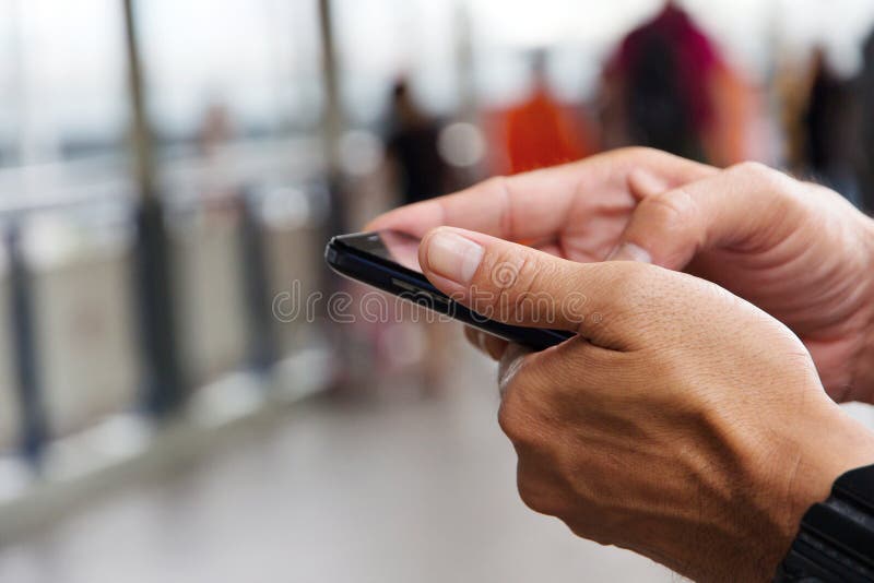Man hand with mobile phone stock image. Image of hands - 33789045