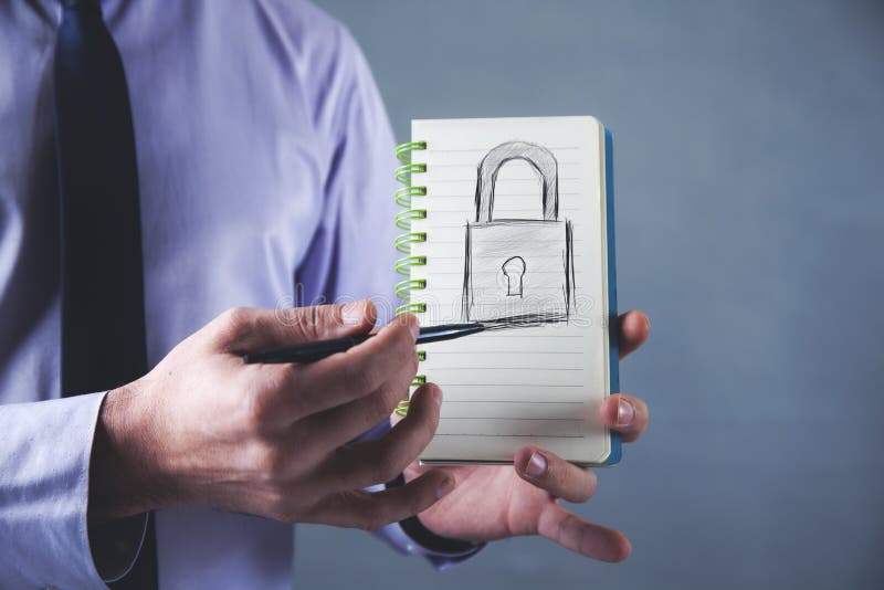 Man hand notepad with lock stock image. Image of double - 174589005