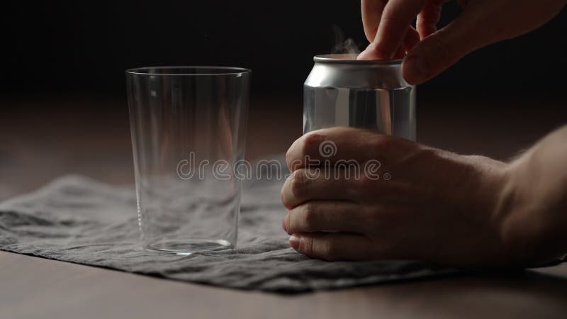Man Hand Open Can with Drink on Wood Table Stock Image - Image of open ...
