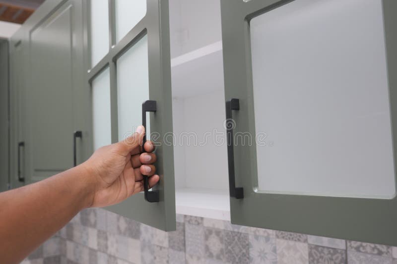 Man Hand Open a Kitchen Cabinet Drawer Stock Photo - Image of hand ...