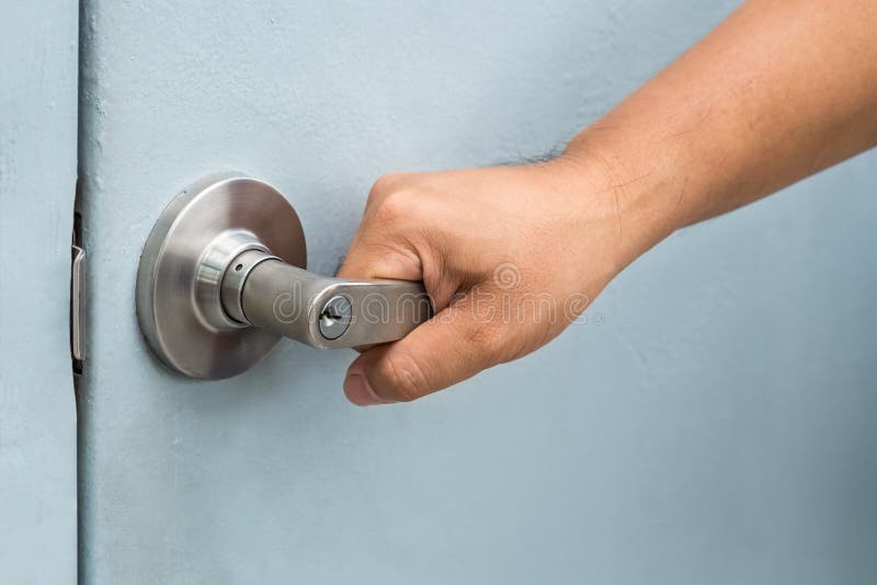 Man hand opening door knob stock image. Image of knob - 96786437