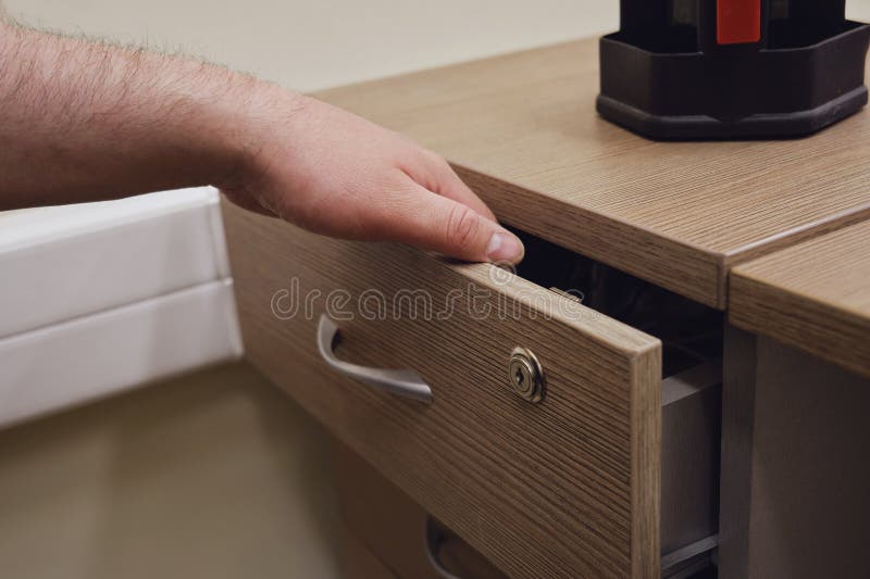 Man Hand Opens the Office Desk Drawer, Close Up Stock Image - Image of ...