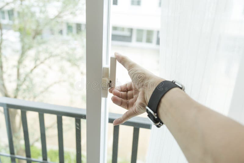 Man Hand Opens a Plastic Window by the Handle. Stock Image - Image of ...