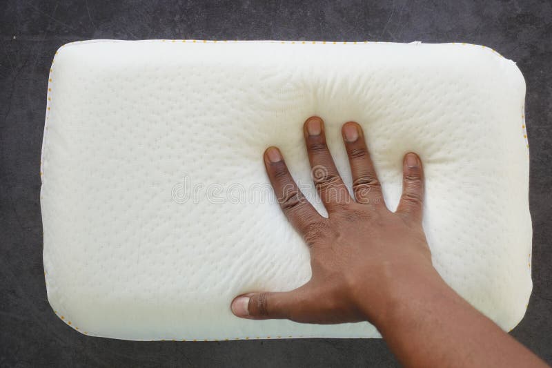 Man Hand on Orthopedic Pillow on a Bed Stock Image - Image of light ...