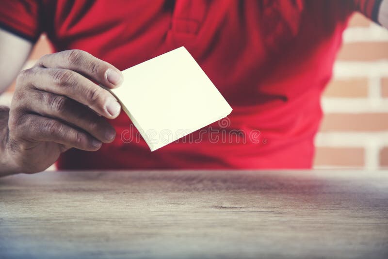 Man hand paper stock photo. Image of isolated, note - 153580336