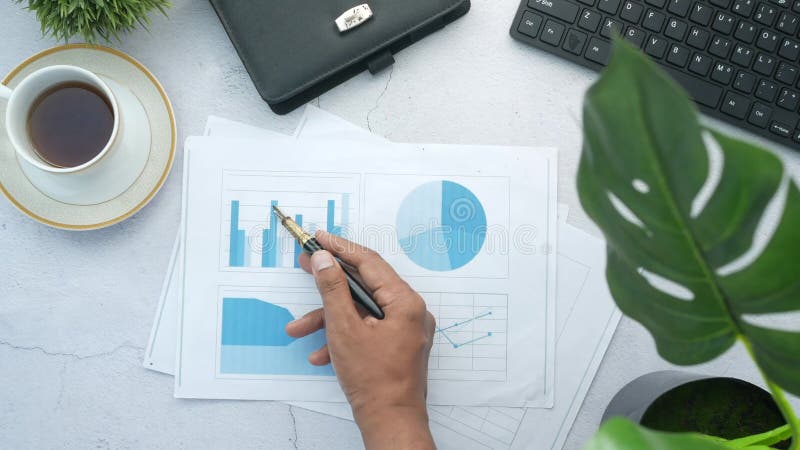 Man Hand with Pen Analyzing Bar Chart on Paper Stock Video - Video of ...