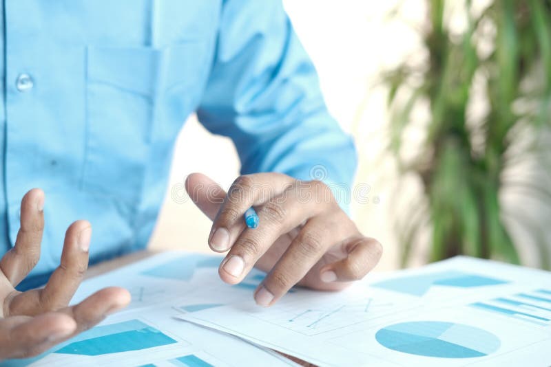 Man Hand with Pen Analyzing Bar Chart on Paper Stock Photo - Image of ...