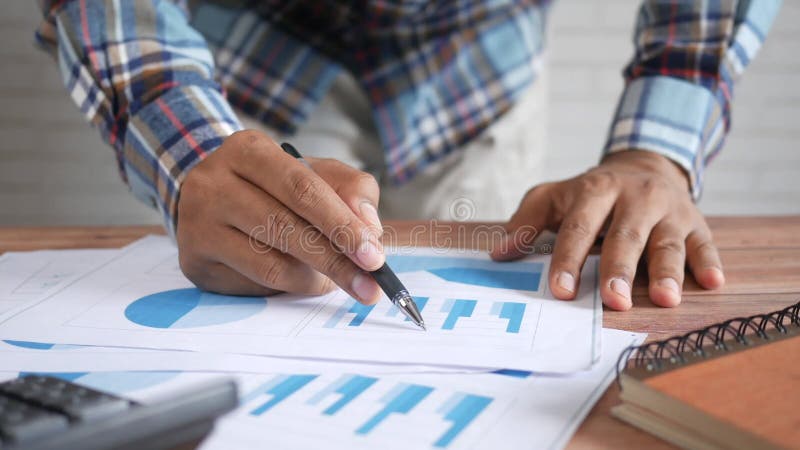 Man Hand with Pen Analyzing Bar Chart on Paper Stock Video - Video of ...