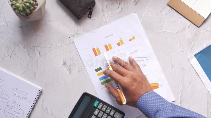 Man Hand with Pen Analyzing Bar Chart on Paper Stock Footage - Video of ... Man Hand with Pen Analyzing Bar Chart on Paper Stock Footage - Video of ...