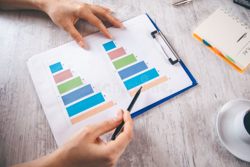 Man hand pen on graph stock photo. Image of chart, analysis - 260866798