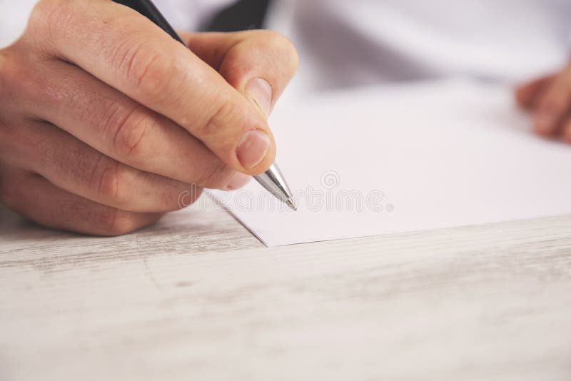 Man hand pen and paper stock photo. Image of document - 176172536