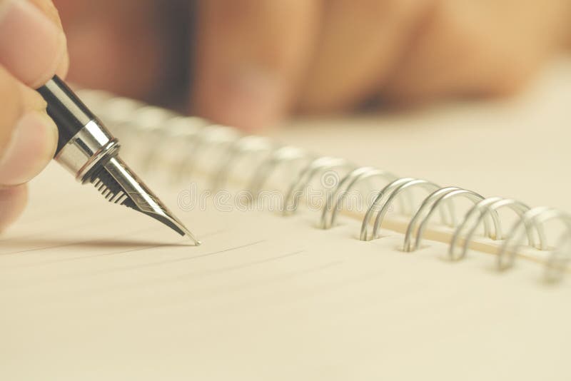 Man Hand with Pen Writing on Notebook Stock Image - Image of diary ...