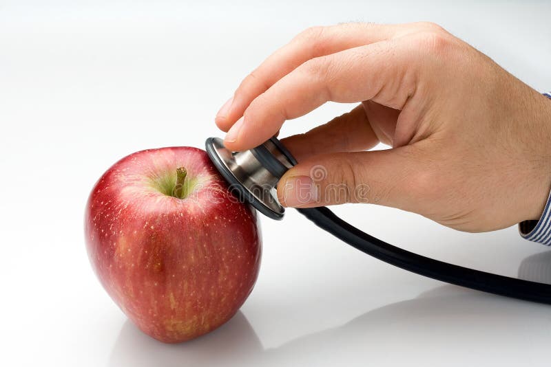 Doctor Examining Red Apple stock image. Image of healty - 30077159