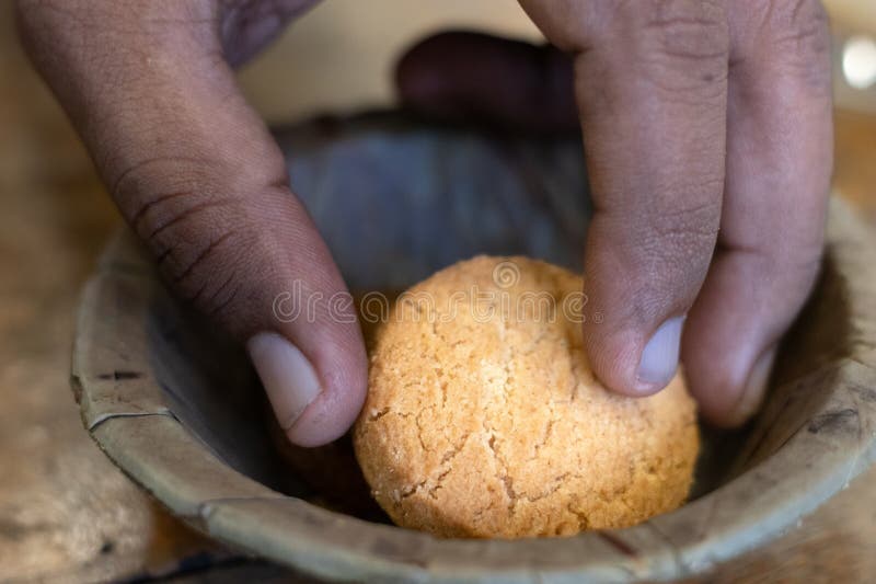 Man Hand Pick Up a Cookie from the Environment Friendly Plate Produced ...