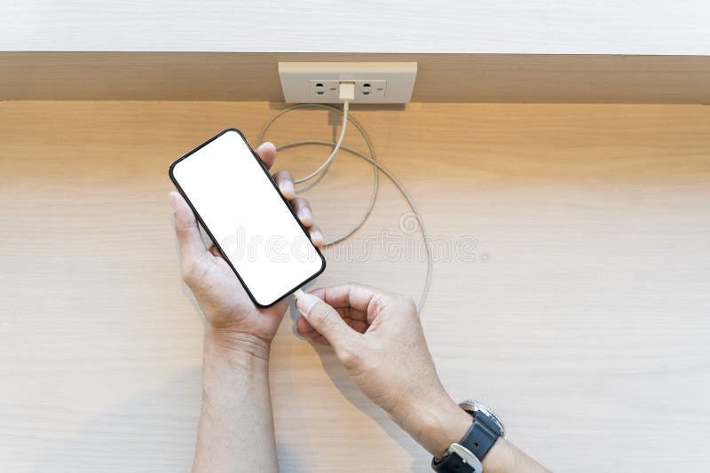 Man Hand Plug in Micro Usb Cable into Blank White Screen Smartphone To ...