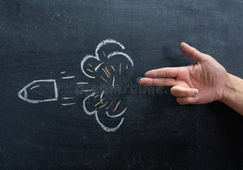 Man Hand Pointing Fingers Like a Gun, the Bullet is Drawn on the Chalk ...