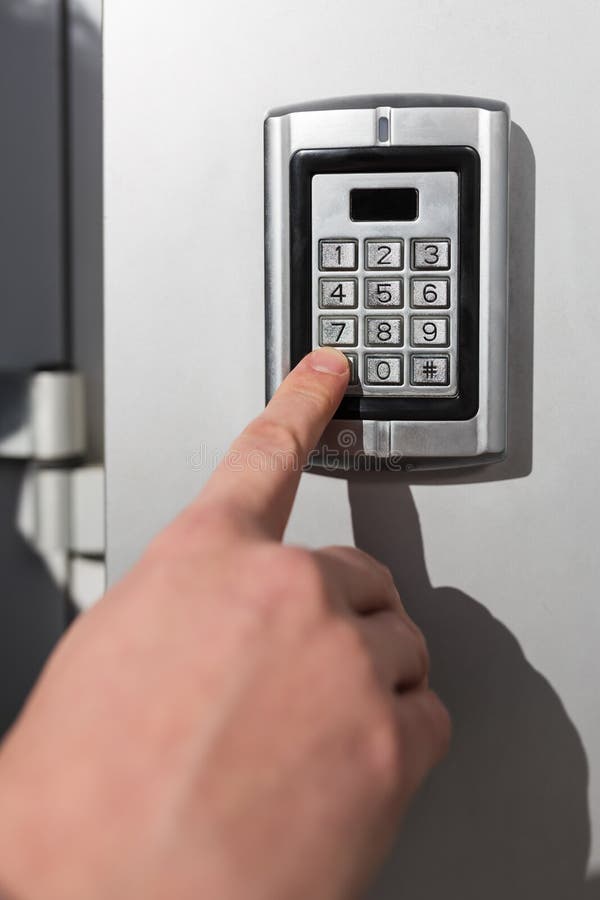 Man Hand Pressing the Security Code Combination To Unlock the Door ...