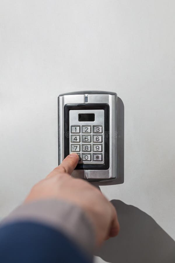 Man Hand Pressing Security Code Combination To Unlock the Door or Safe ...