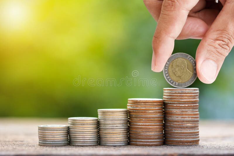 Stack of Coins on Wooden Desk for Saving Money Stock Photo - Image of ...