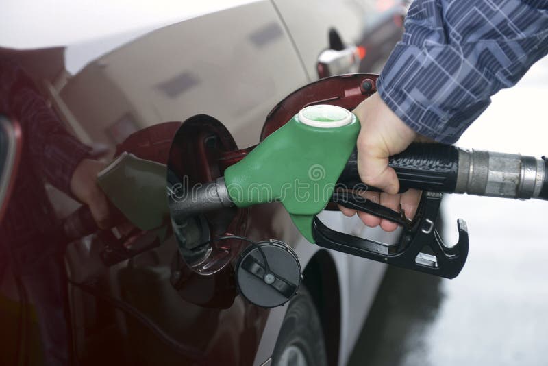 Man Hand Refilling Up Gas Tank of the Car Stock Photo - Image of ...