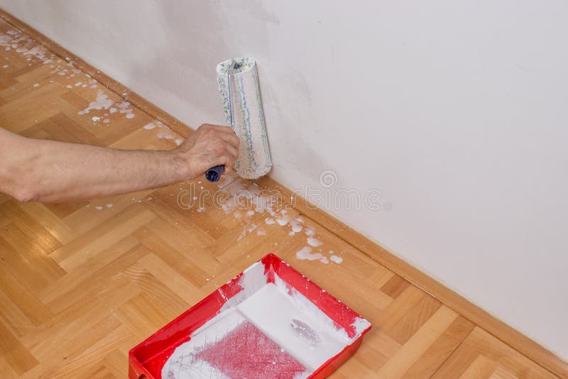 Man Hand with Roller Painting and Paint Tray in Front Stock Photo ...