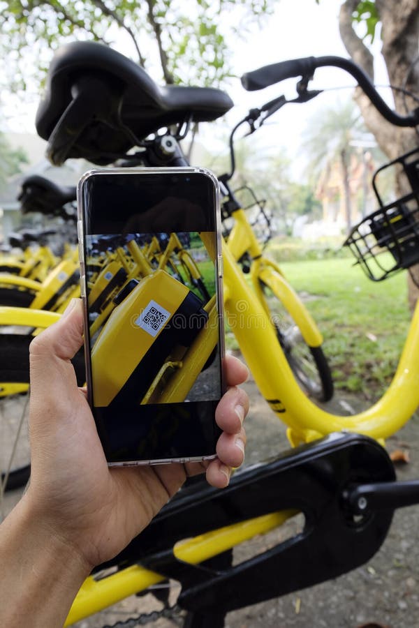 Man Hand Scanning Qr Code To Unlock Bike. Stock Image - Image of ...