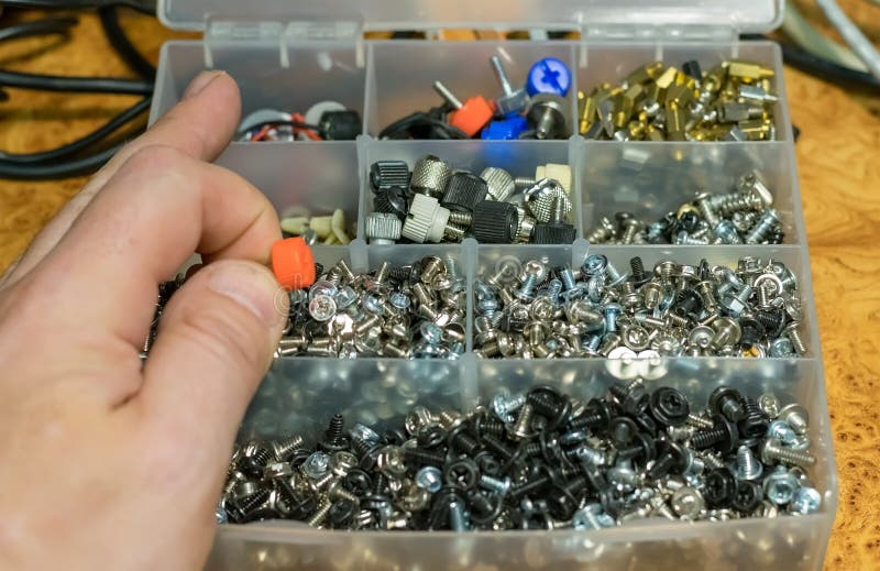 A Set of Different Bolts, Nuts for a Computer in a Box Stock Image ...