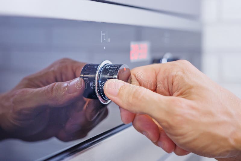 Man Hand Setting Cooking Mode on Electrical Oven. Male Finger Press ...