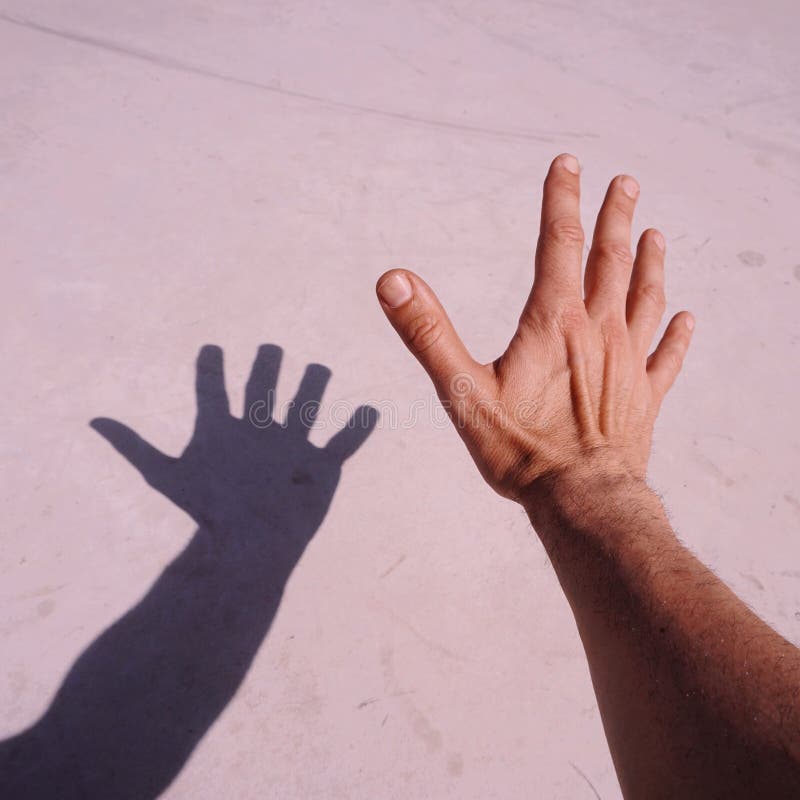 Man hand shadow silhouette stock photo. Image of concept - 152464894
