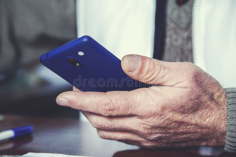Man hand smart phone stock image. Image of business - 170138405